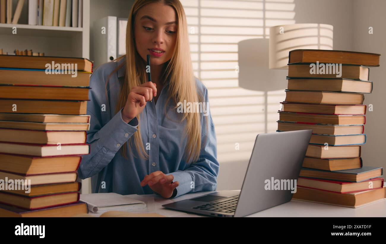 Caucasian student happy smiling girl woman studying with laptop and ...