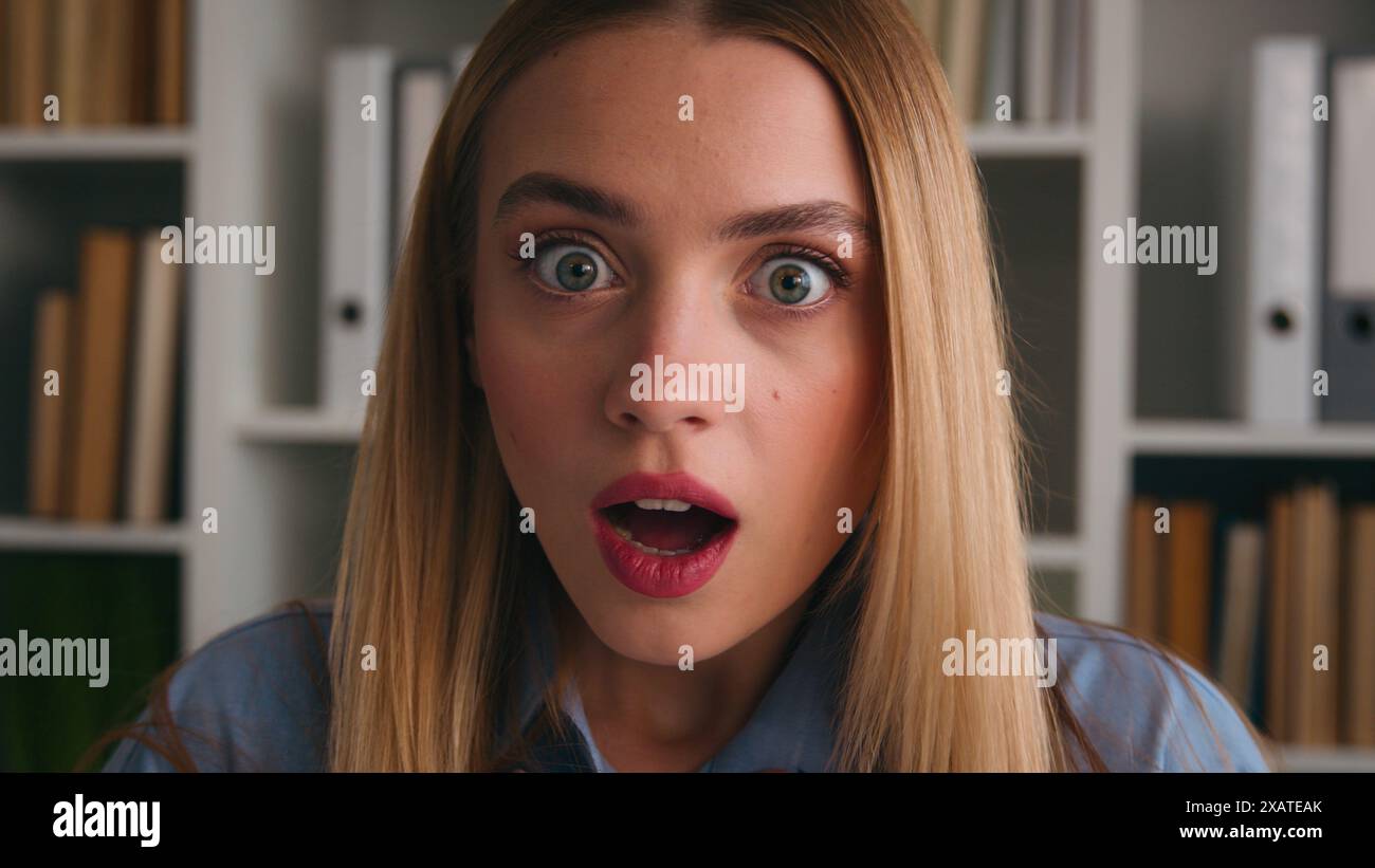 Shocked female face big eyes open mouth portrait amazed astonished stunned wonder astonish ...