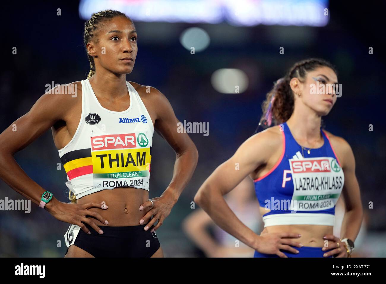 Gold medalist Nafissatou Thiam, of Belgium, and silver medalist Auriana Lazraq-Khlass, of France ...