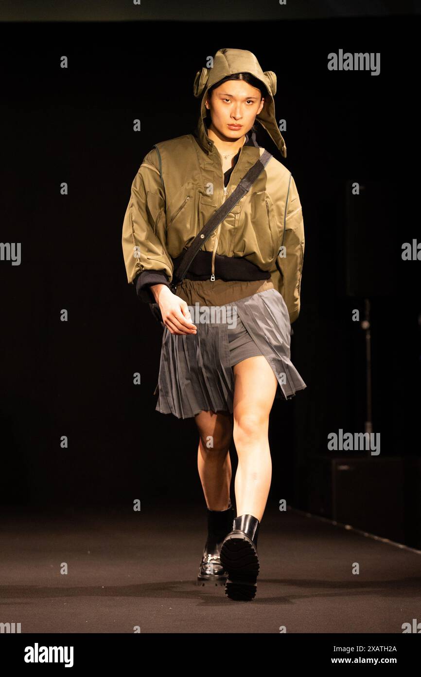 London, UK. Saturday June 8, 2024. A model on the catwalk wearing a ...