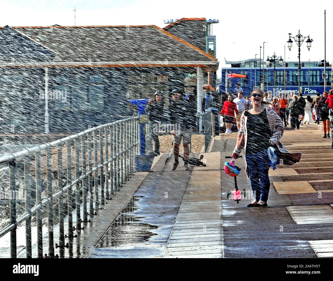 ENGLISH COASTAL PATH. GETTING SPLASHED BY THE WAVES, CLARENCE ESPLANADE ...