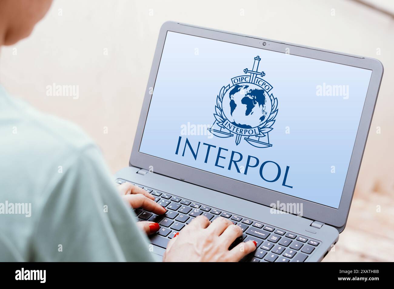 In this photo illustration, the Interpol (International Criminal Police ...