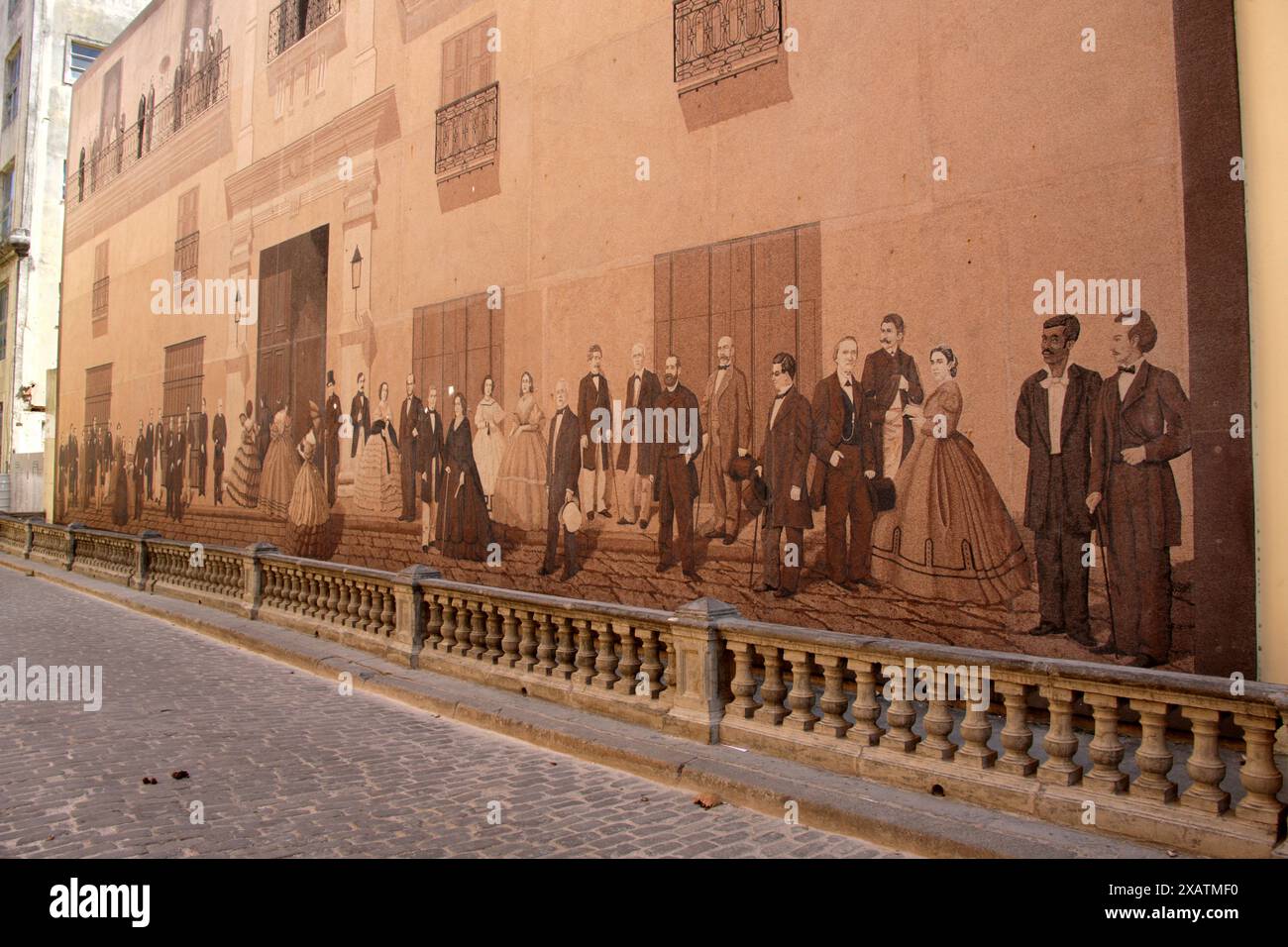 A sand mural depicting life in colonial Havana with many of it's famous ...