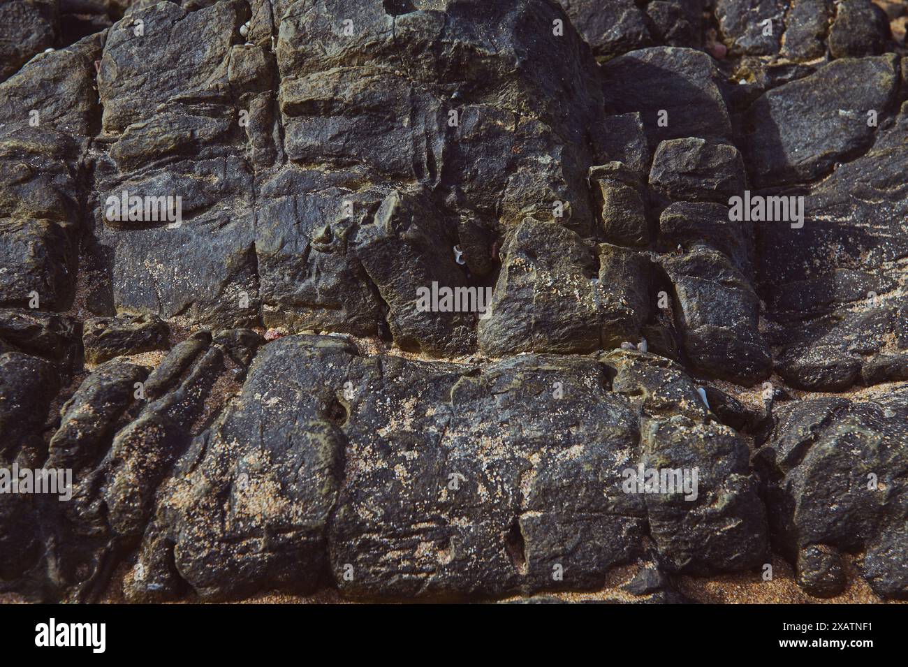 Close-up of a natural rock formation showcasing rugged textures and ...