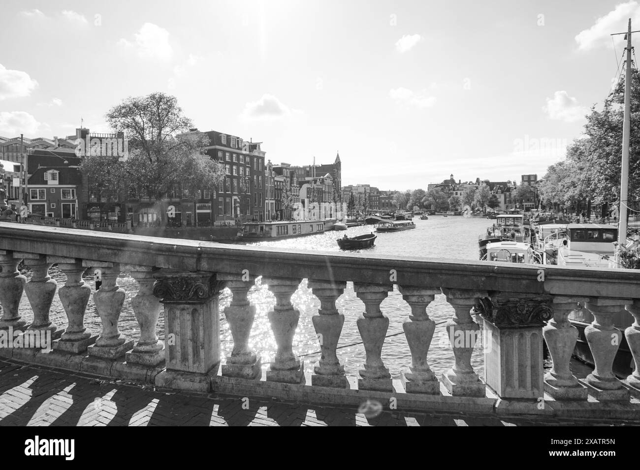 Person crossing bridge river Black and White Stock Photos & Images - Alamy
