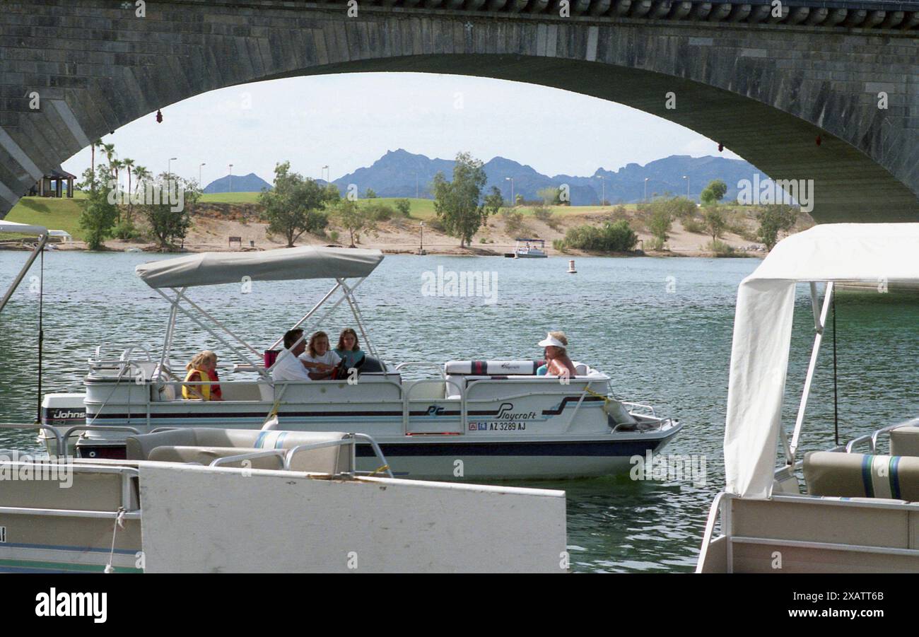 Arizona, U.S.A., approx. 1992. People enjoying a ride on a pontoon boat ...
