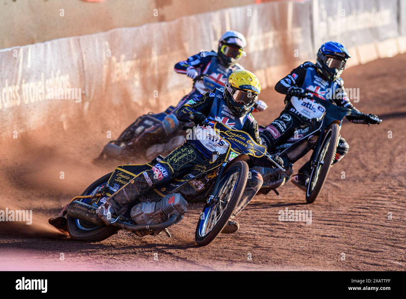 Kyle Howarth in Yellow leading Tai Woffinden in Blue and Anders Rowe in ...