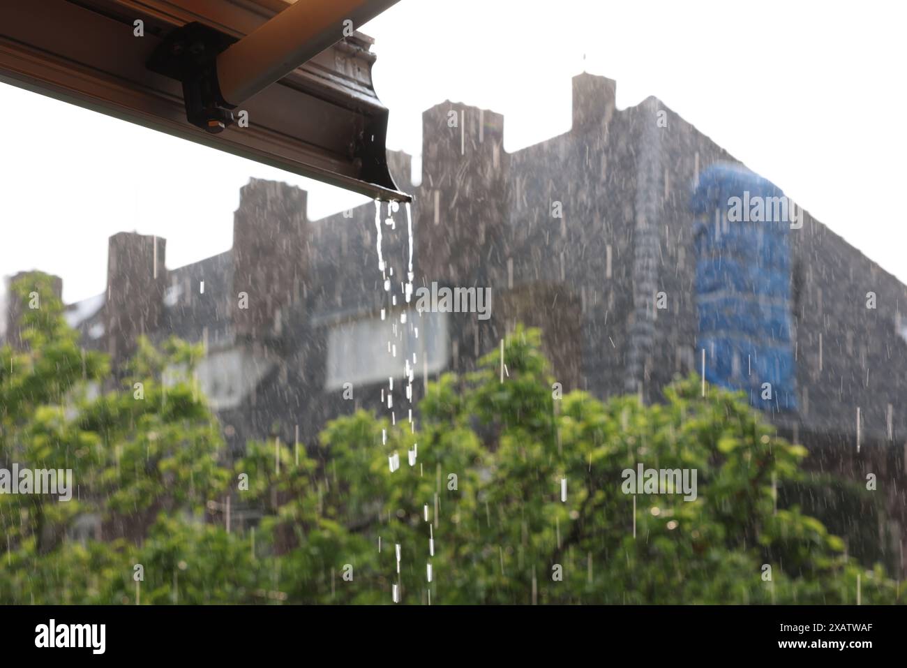 Rain storm on awning rainy hi-res stock photography and images - Alamy