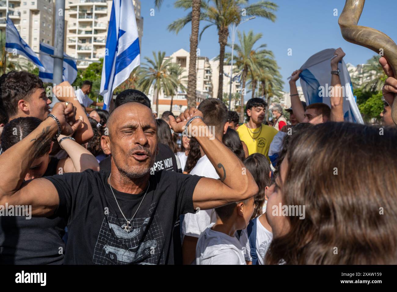 A man seen singing and dancing following the announcement of the rescue ...