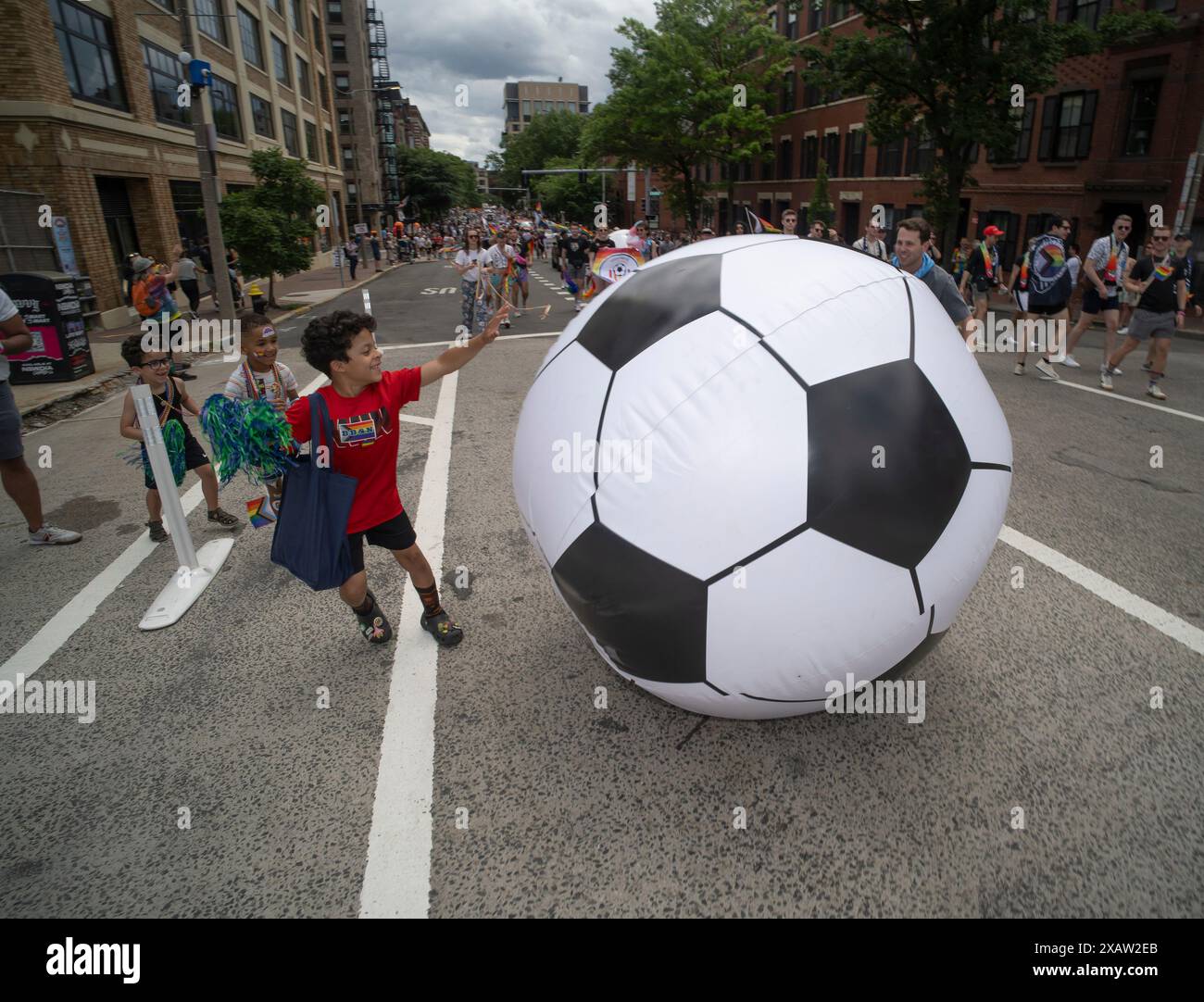 Boston, Massachusetts, USA June 8, 2024. A child plays with a huge ...