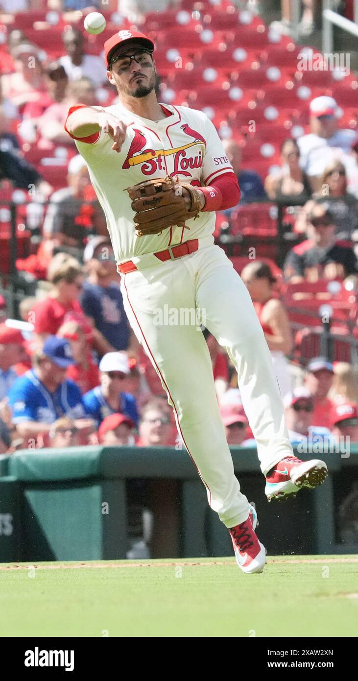 St. Louis Cardinals third baseman Nolan Arenado leaves his feet as he ...