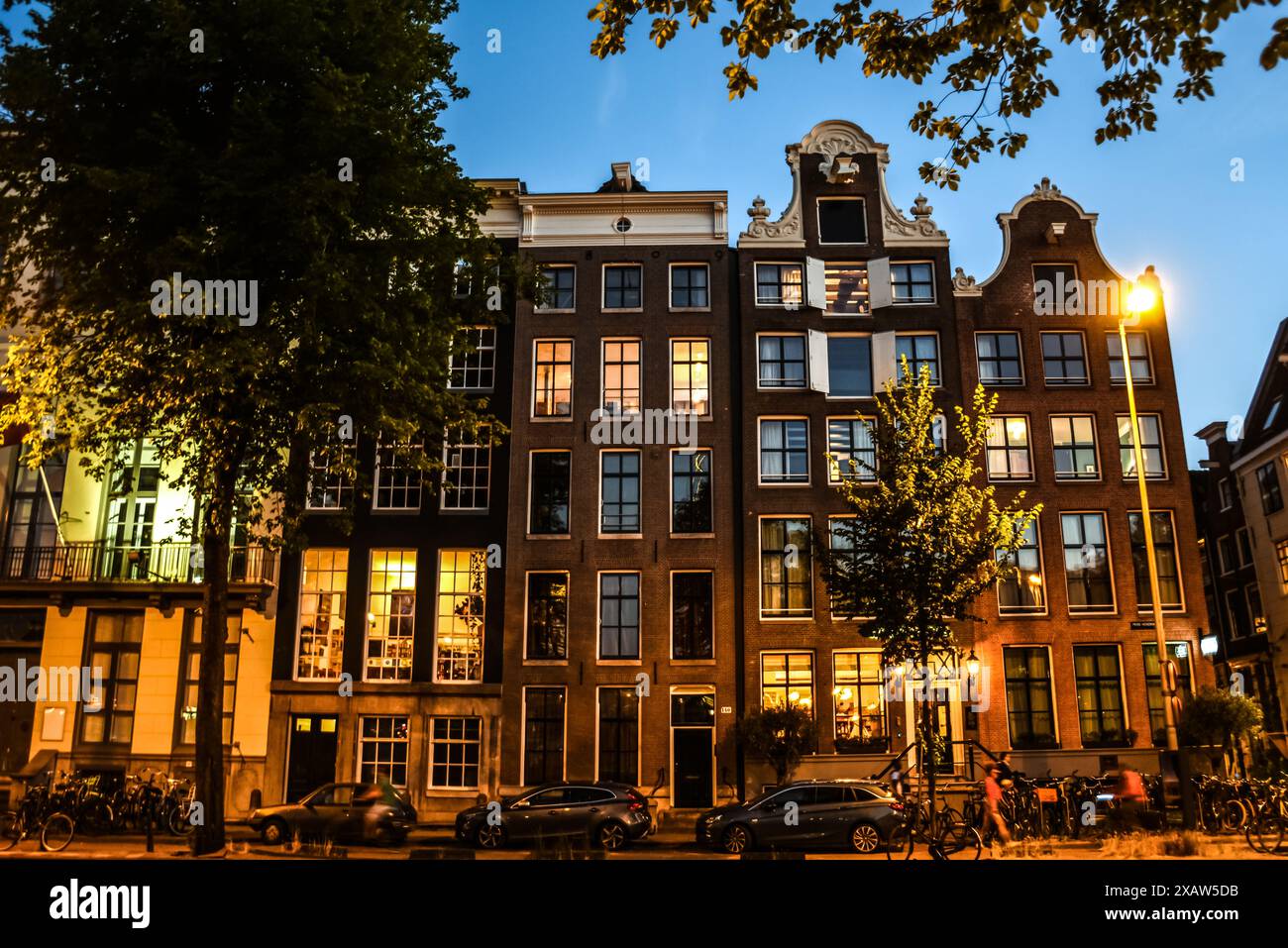 Evening View of Illuminated Traditional Buildings in Amsterdam Stock ...