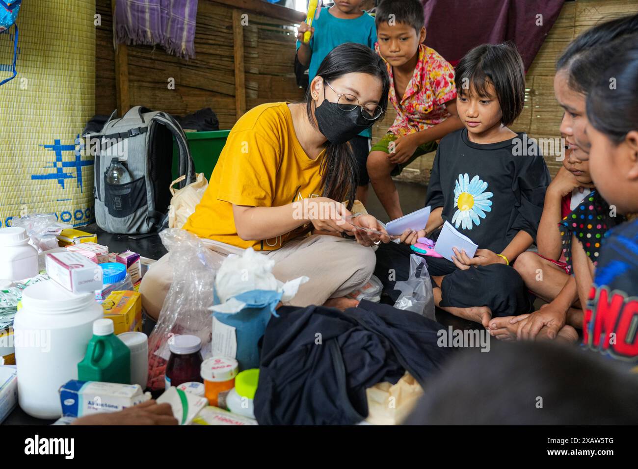 A civil disobedience movement's medical student seen explaining about the tablets to a patient ...