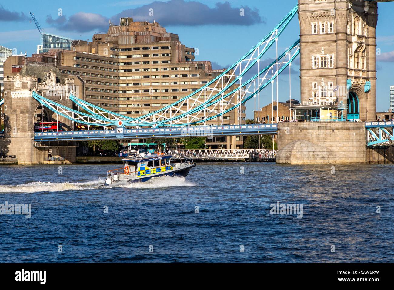 Red london bus crosses tower hi-res stock photography and images - Alamy