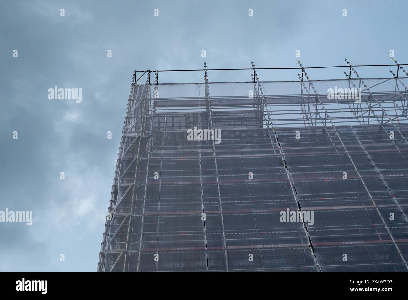 Renovation work. Safety in workplace, scaffolding with fall protection ...