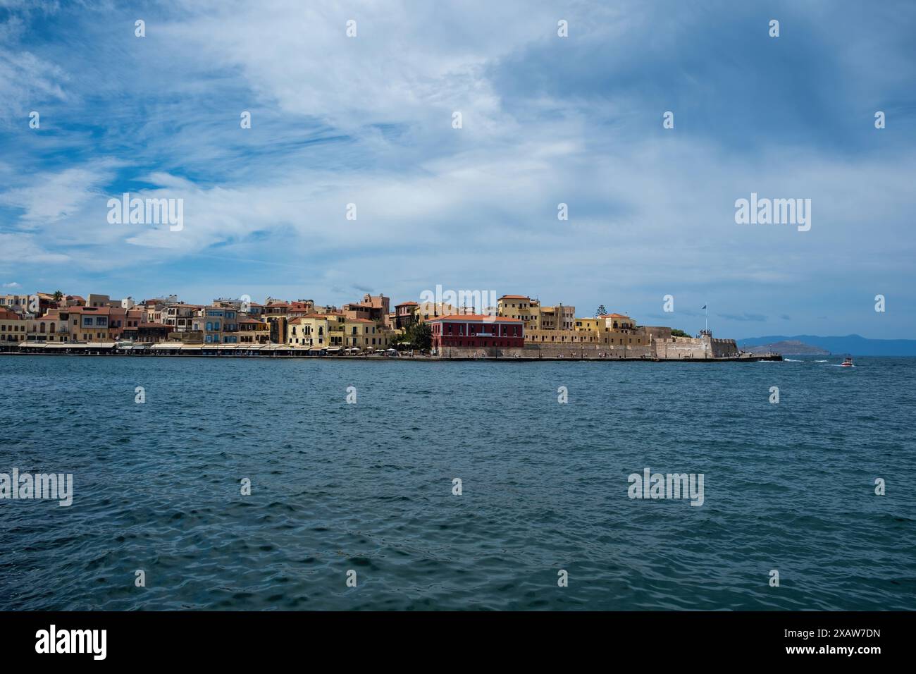 Greece, Chania Town Crete. View of outdoors cafe, Firkas Fortress and ...