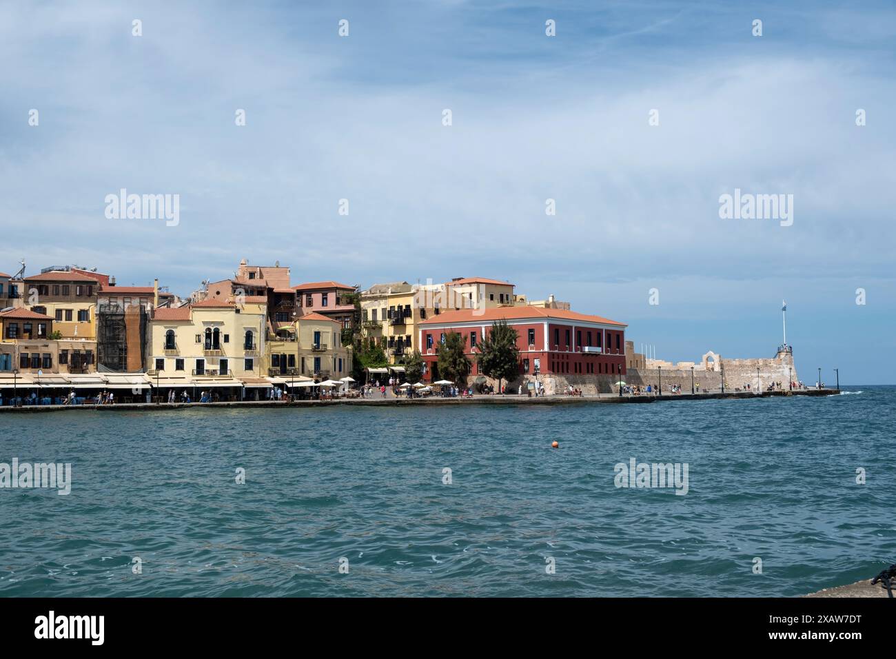 Greece, Chania Town Crete. View of outdoors cafe, Firkas Fortress and ...