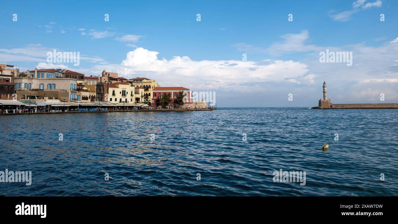 Greece, Chania Town Crete. View of outdoors cafe, Firkas Fortress and ...