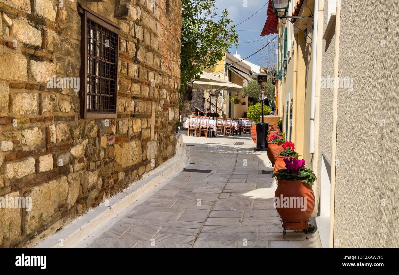 Athens, Greece. Greek traditional open-air tavern empty table and chair ...