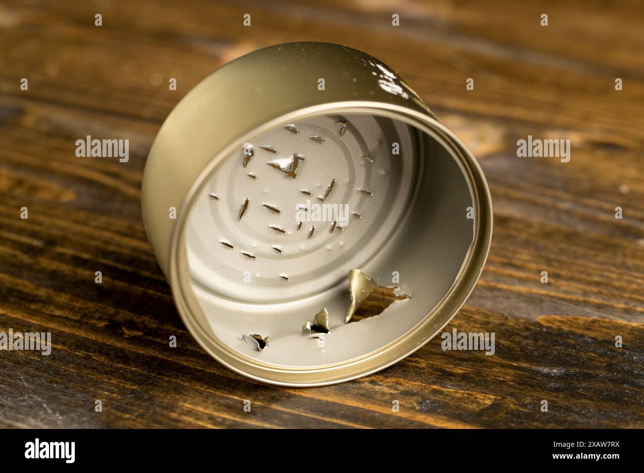 an empty old punctured tin can, an empty can with a lot of damage Stock ...