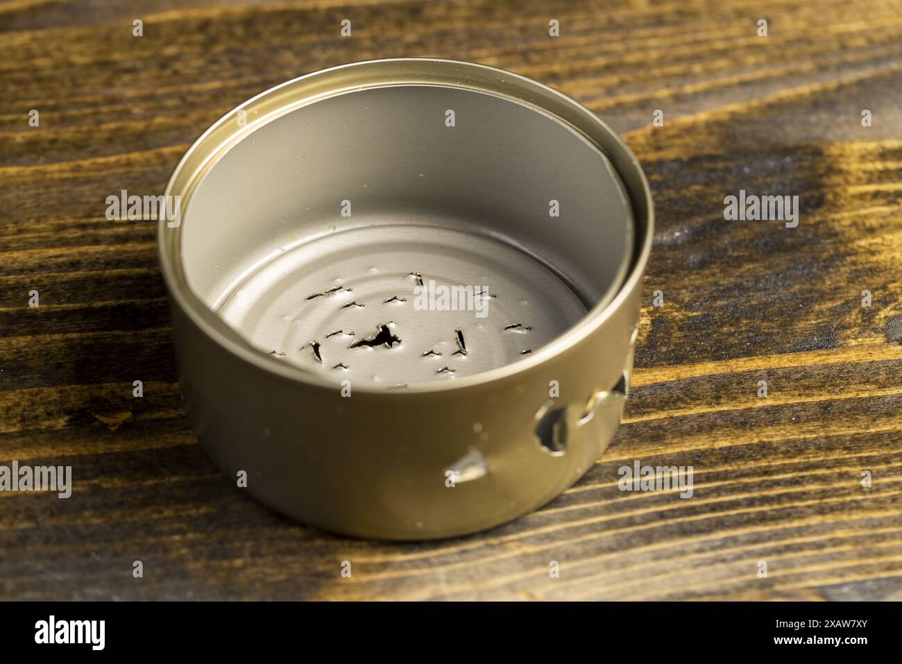 an empty old punctured tin can, an empty can with a lot of damage Stock ...