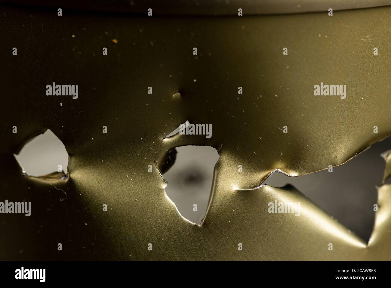 an empty old punctured tin can, an empty can with a lot of damage Stock ...