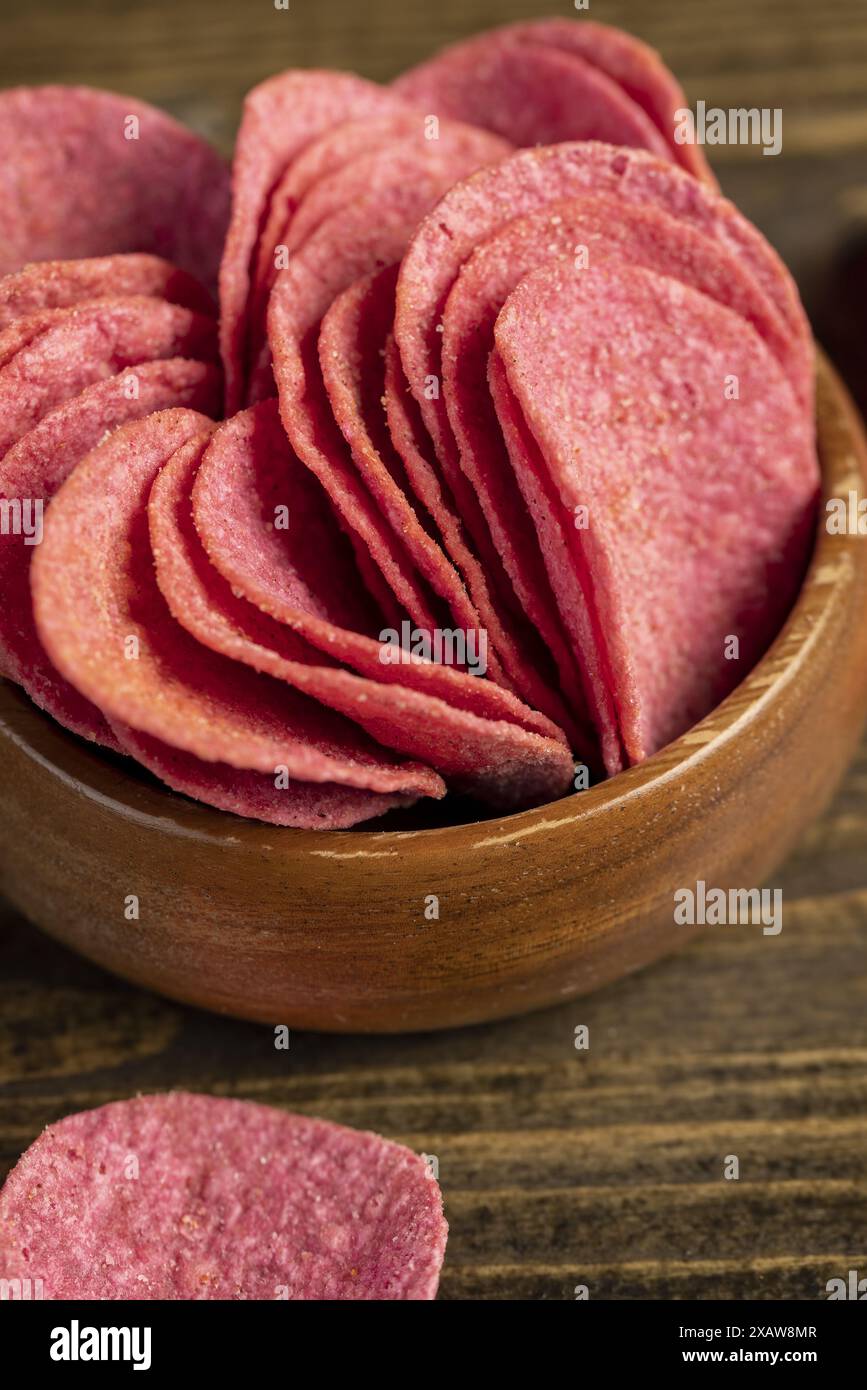 red potato chips with meat flavor, adding red dye to potato chips Stock ...