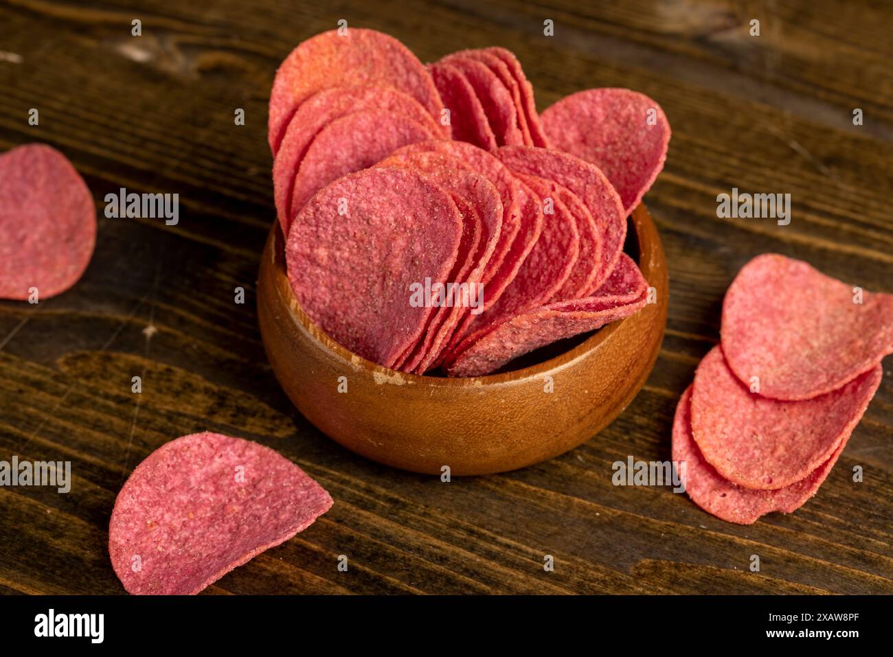red potato chips with meat flavor, adding red dye to potato chips Stock ...