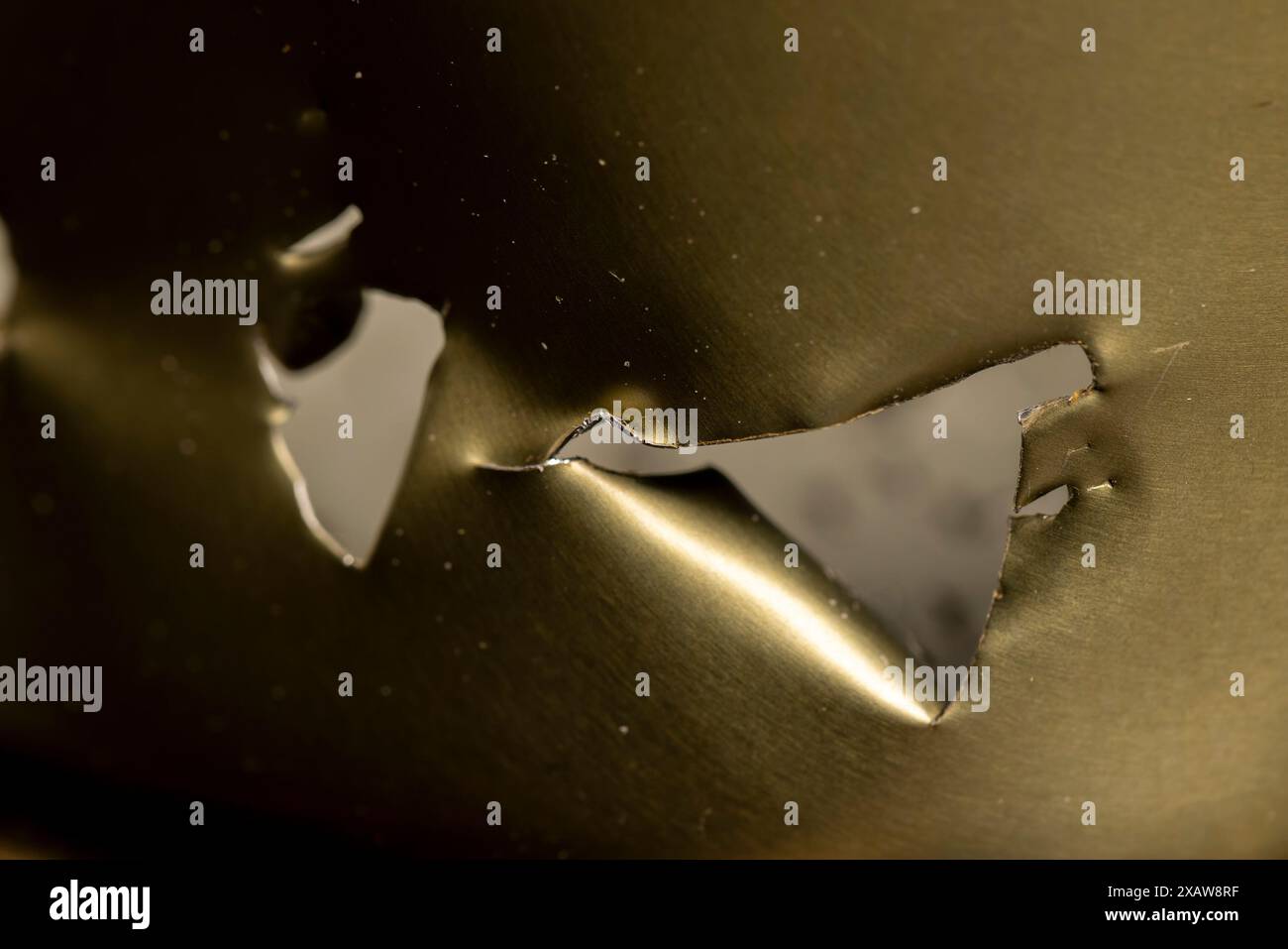 an empty old punctured tin can, an empty can with a lot of damage Stock ...