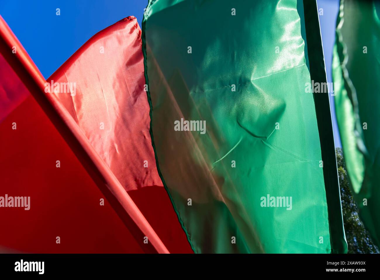 green flags set up during the celebration in windy weather, flags ...