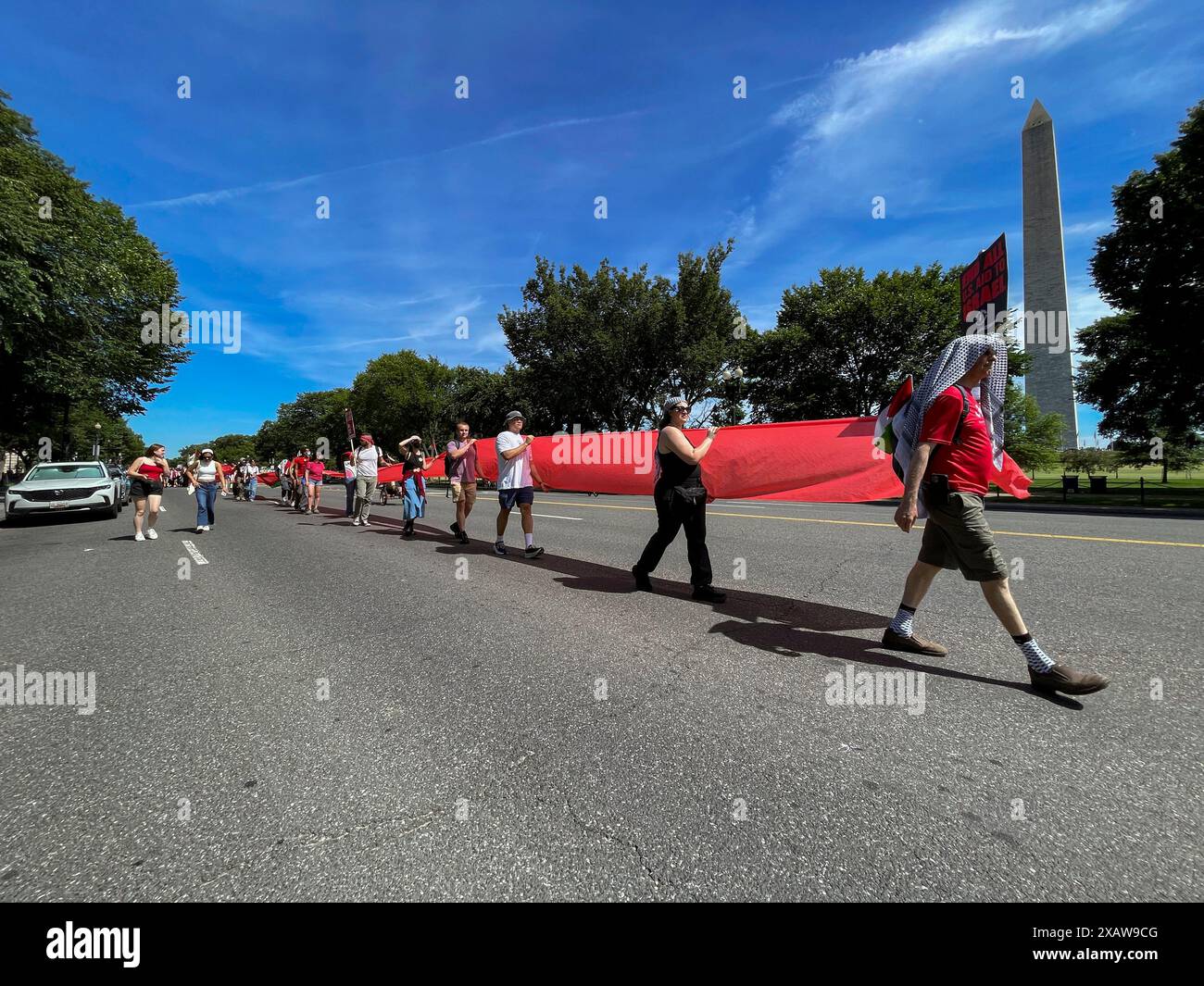 Washington, District Of Columbia, USA. 8th June, 2024. Protestors carry ...