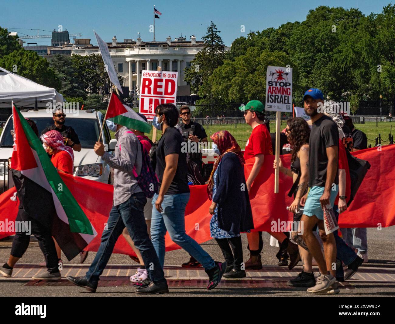 Washington, District Of Columbia, USA. 8th June, 2024. Protestors carry ...