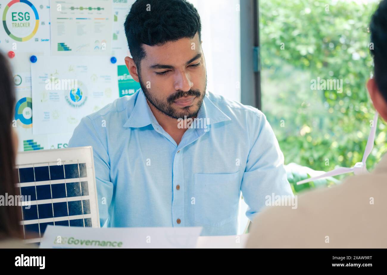 diversity team brainstorming discussion focused on ESG (environment,social,governance) for sdgs ...