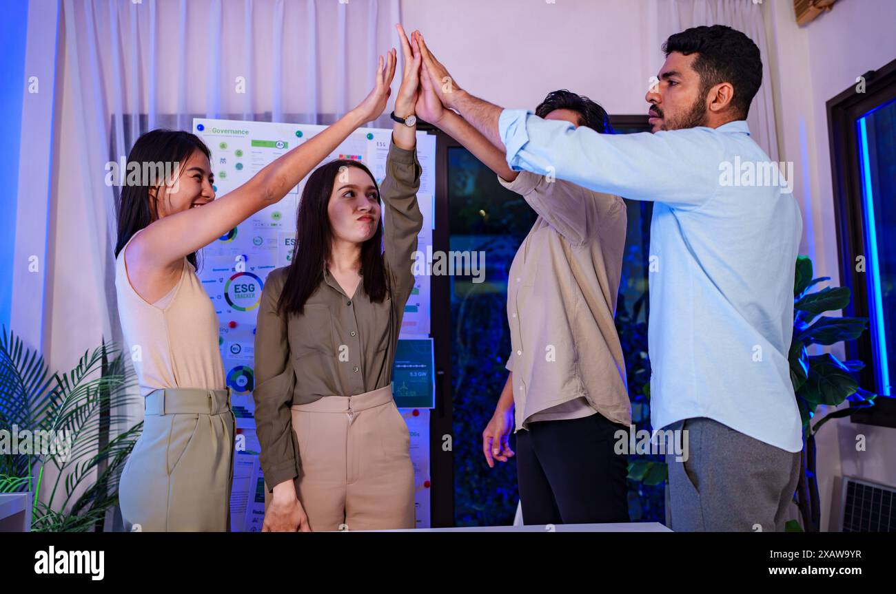 diversity team celebration and high five of sustainability goals is ...