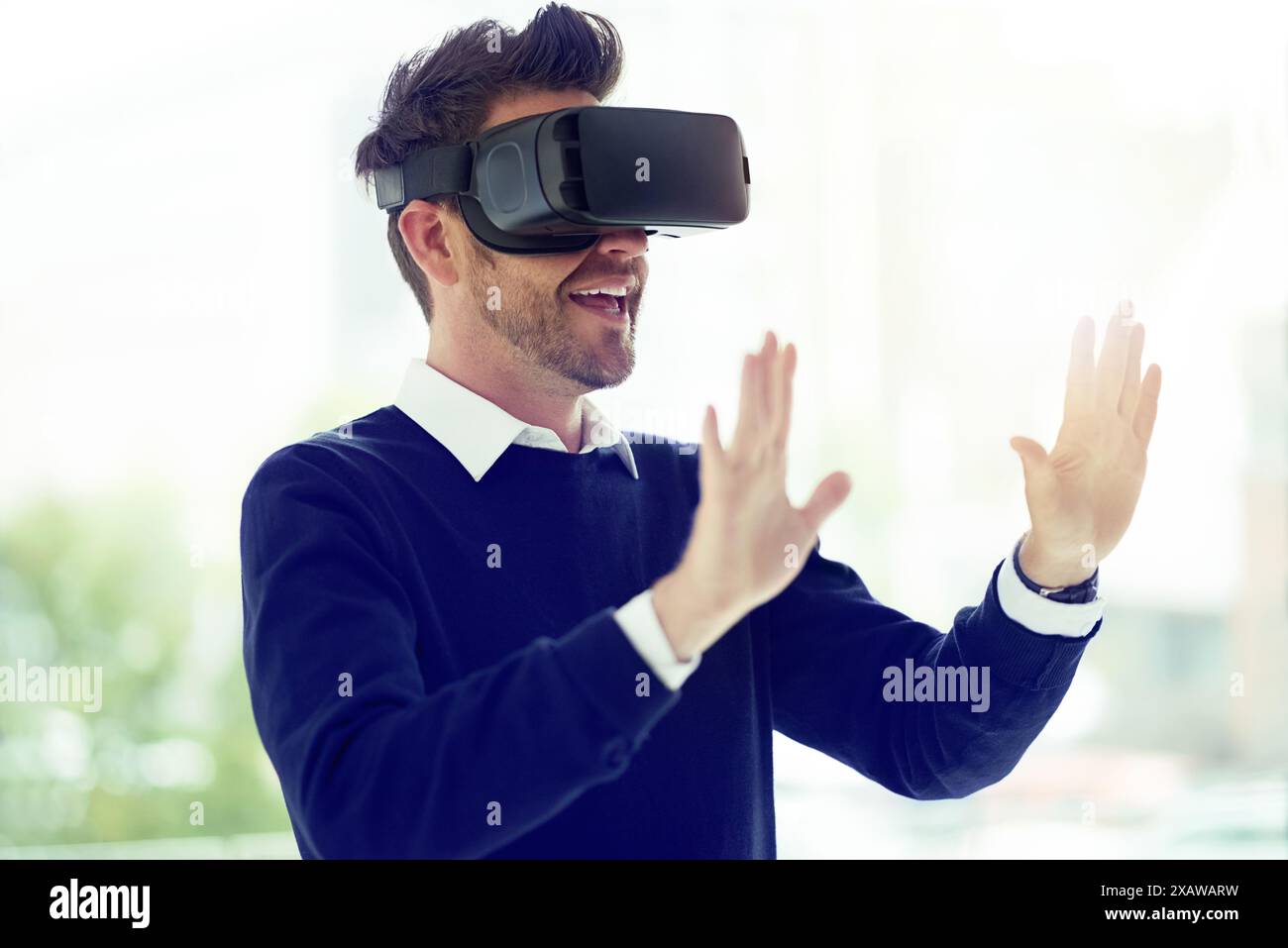 Man, virtual reality and happy in office with hands to test 3d user ...