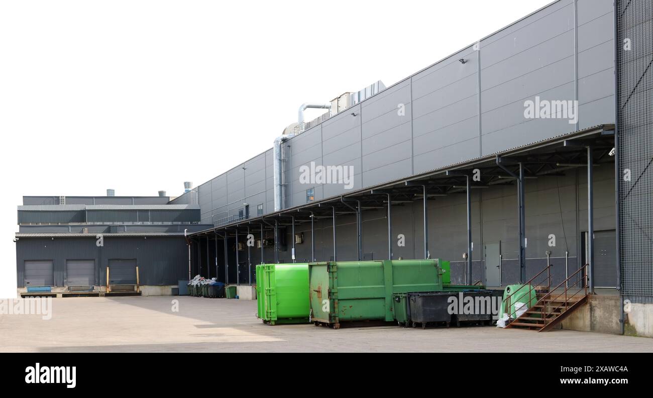 Cargo terminals and waste containers in the backyard of a supermarket ...