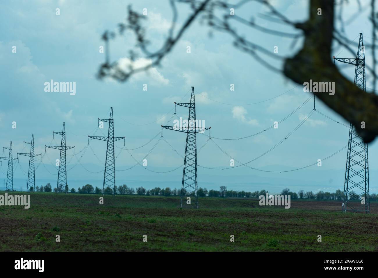High voltage towers with sky background. Power line support with wires ...