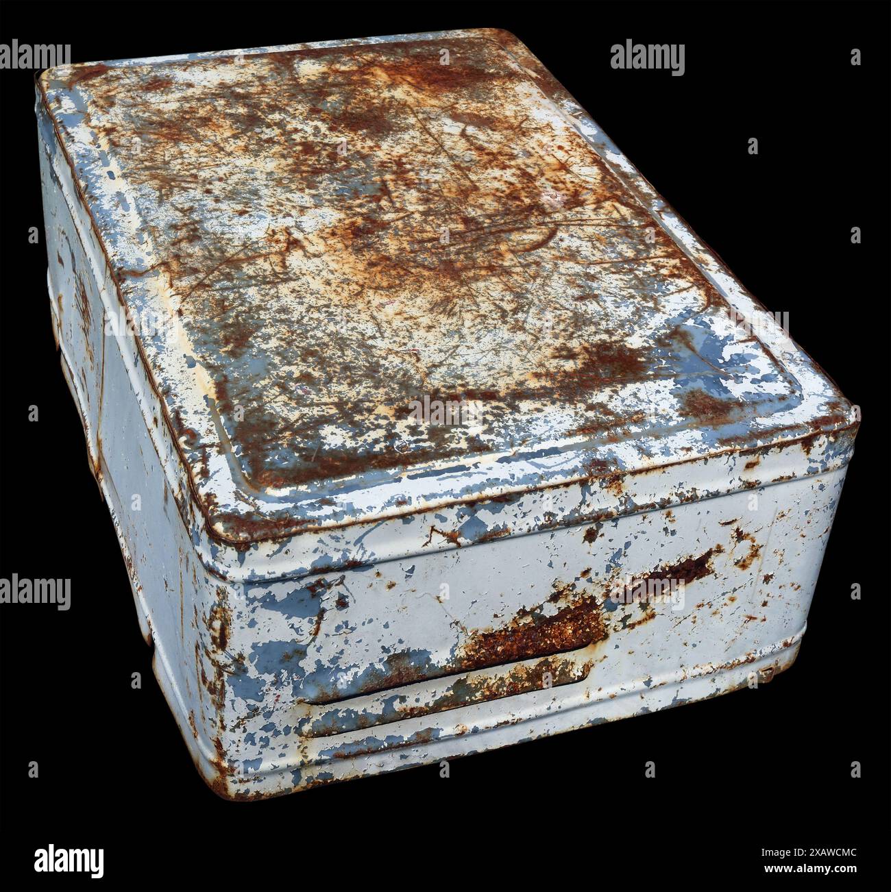 The rusty tin box was once painted white. Isolated on black Stock Photo ...