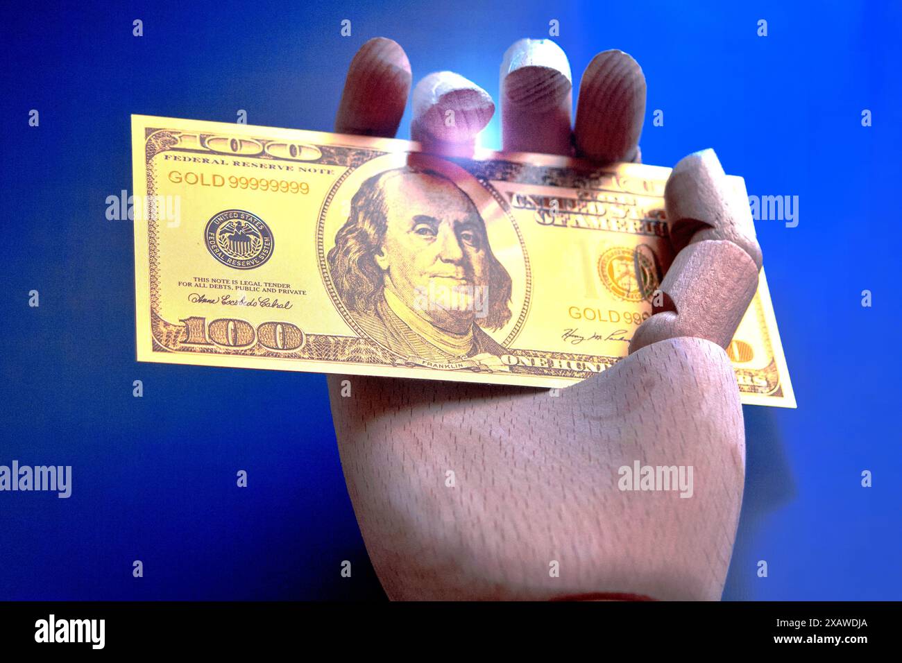 Humanoid robot hand hold a 100 dollar banknote.Making profit money ...