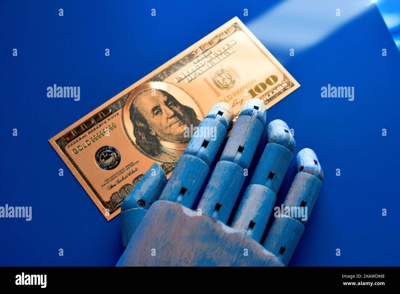 Robotic hand with one dollar bill. Concepts of investment in Artificial ...
