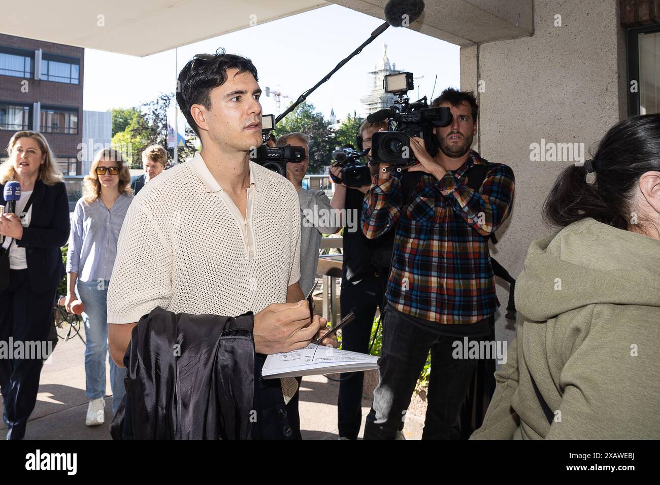 Vooruit's Conner Rousseau casts his vote at a polling station in Sint ...