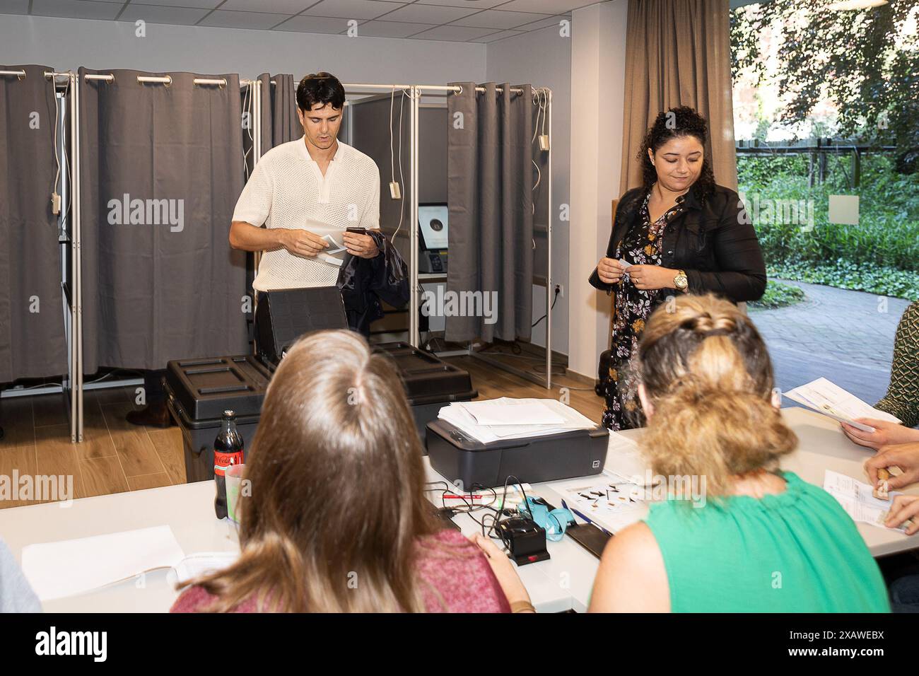 Vooruit's Conner Rousseau casts his vote at a polling station in Sint ...