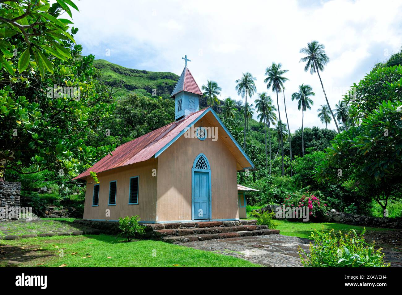 Pretty pink village church at Hooumi, Nuku Iva Island, Marquesas ...