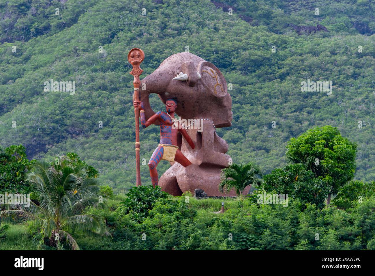 Giant Tiki statue above the small village of Taiohae on Nuku Hiva ...
