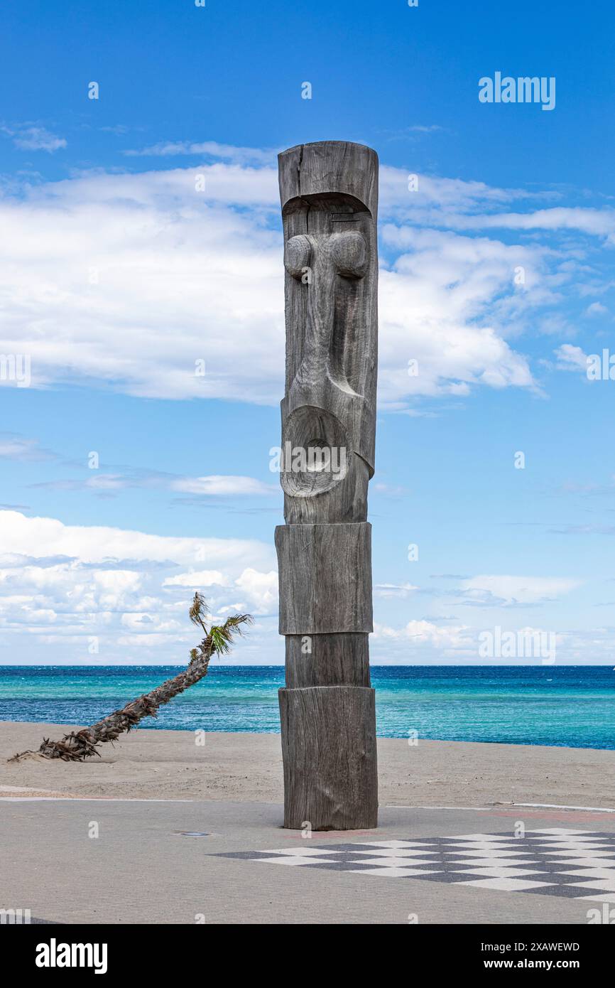 A totem pole in Place des totems - Soleillonautes, Le Barcares, France ...