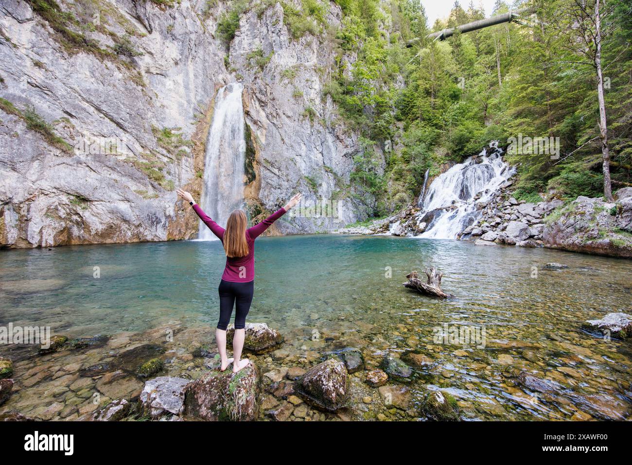 St. Martin Am Grimming, Austria. 20th May, 2024. A young woman stands ...