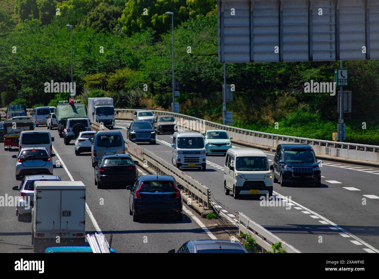 A traffic jam at the city highway in Tokyo telephoto shot Stock Photo ...