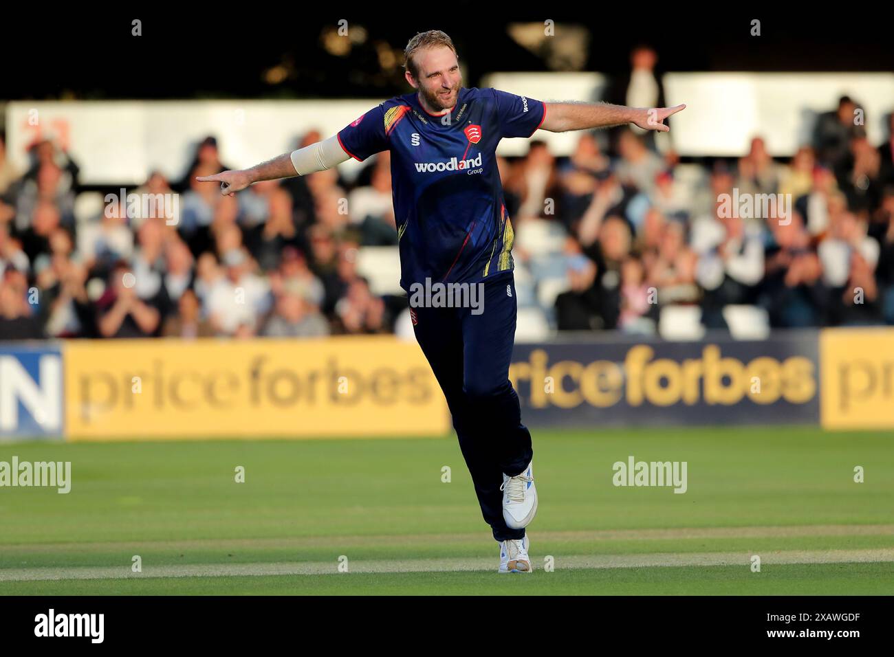 Paul Walter of Essex celebrates with his team mates after taking the ...