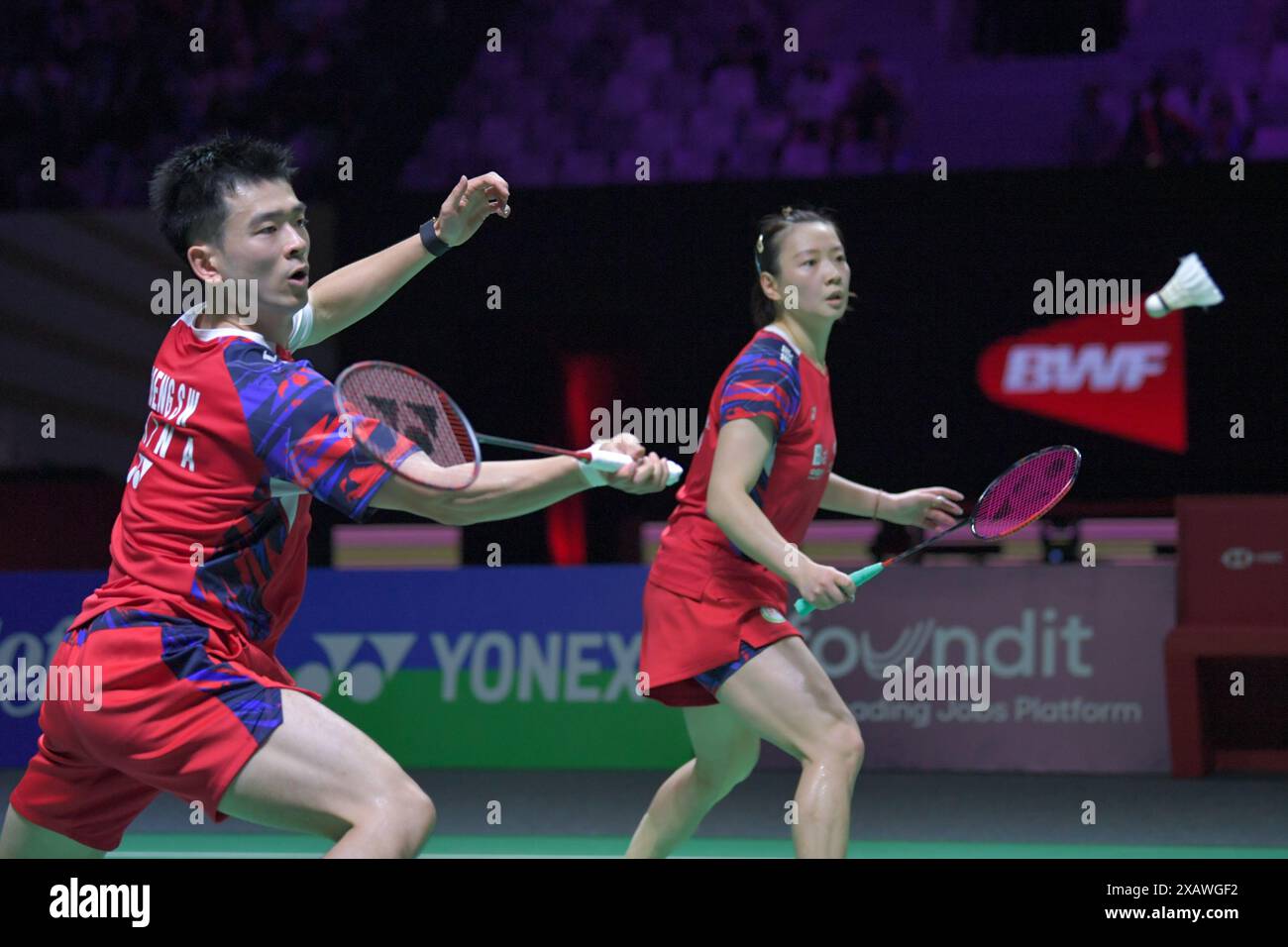 Jakarta, Indonesia. 9th June, 2024. Zheng Siwei (L)/Huang Yaqiong compete during the mixed ...