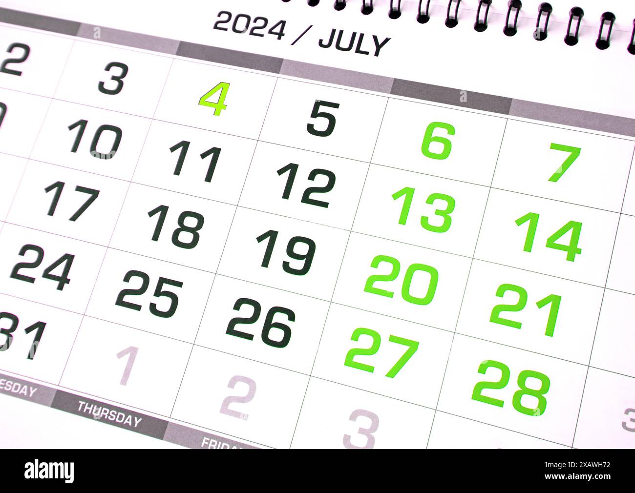 Calendar page for July 2024, close-up Stock Photo - Alamy